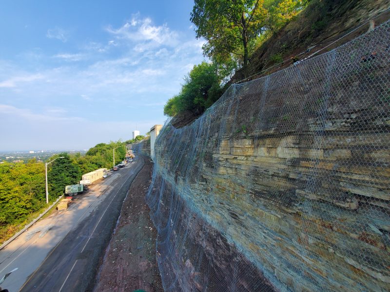 Innovative Draped Mesh Systems: Ensuring Long-Term Stability