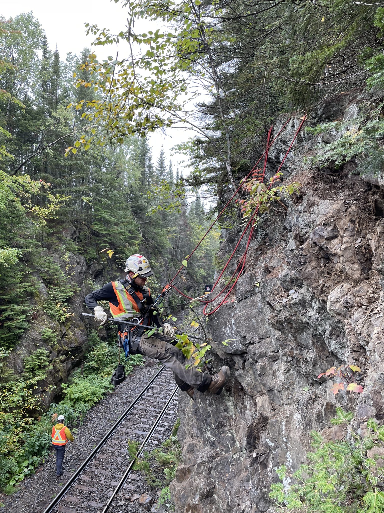 Expert Manual Scaling Services for Rockfall Mitigation